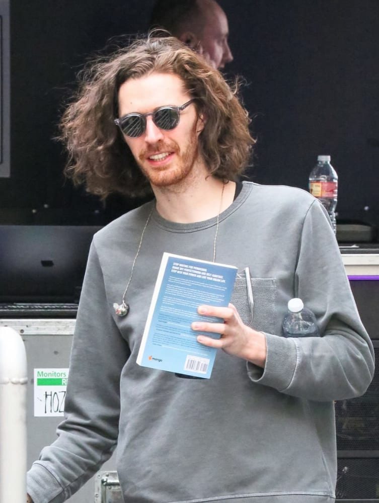 i really feel like a wild animal…….. hozier is reading a self help book ...