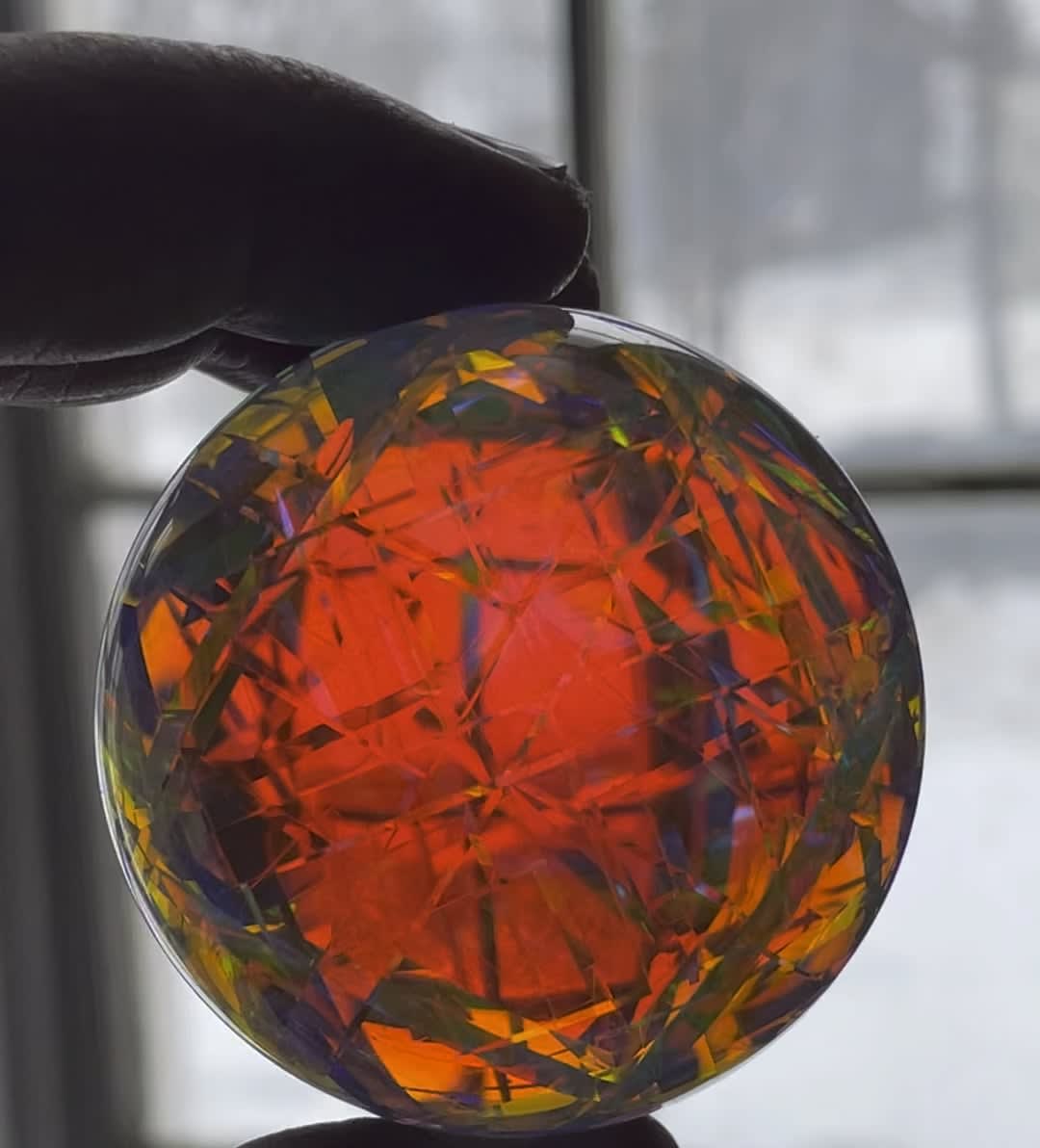 A glass sphere made with dichroic glass and optically clear low iron ...