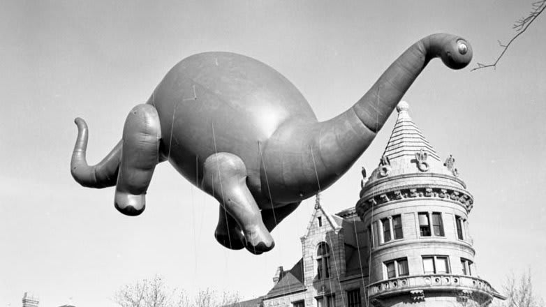 Here’s a festive TBT featuring an Apatosaurus balloon floating beside ...