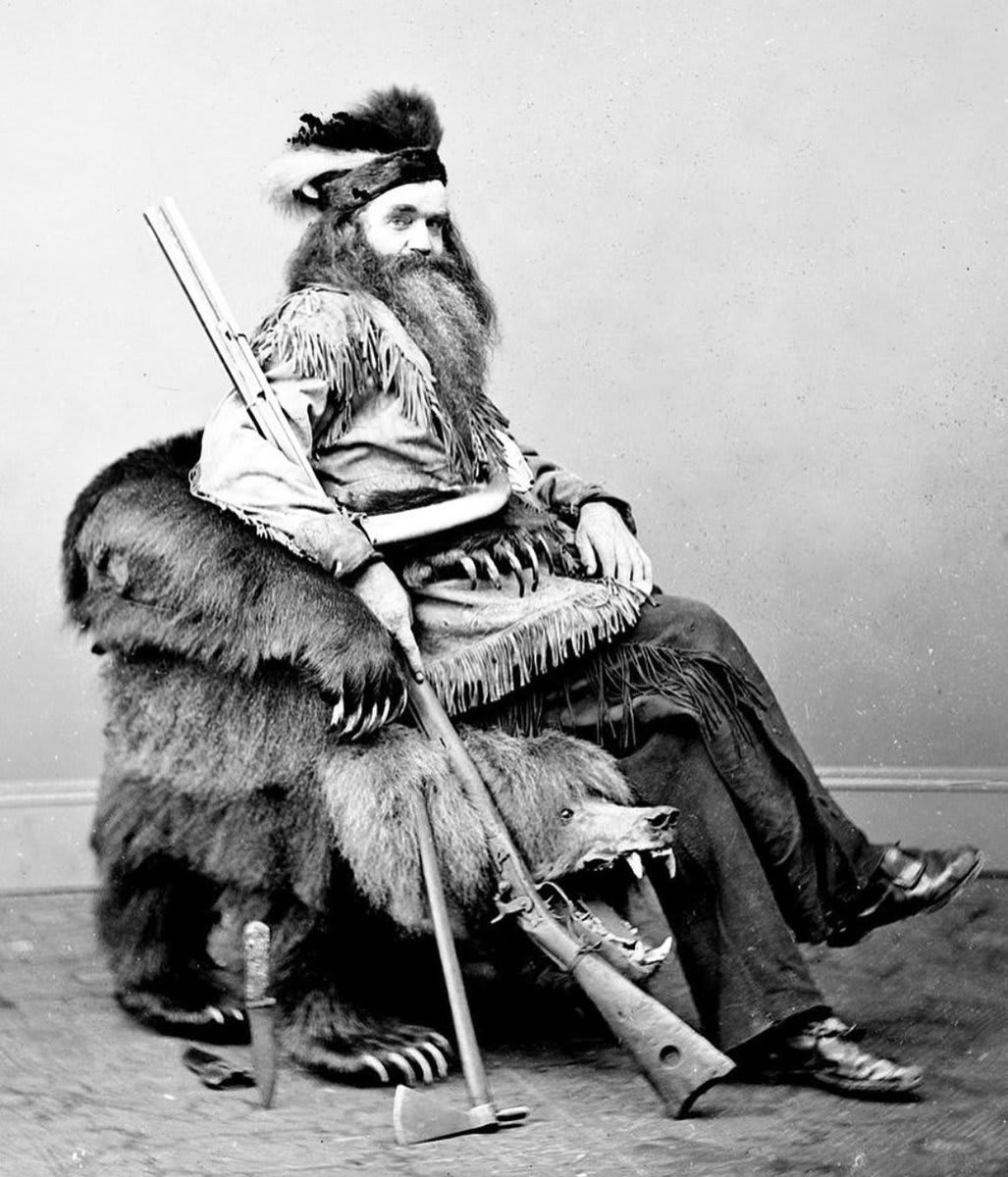 California hunter and trapper Seth Kinman sitting in a chair made out ...