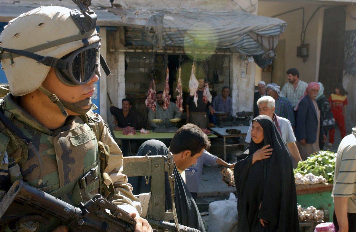 “A US Army (USA) Soldier assigned to the 173rd Airborne Brigade, on security patrol through the ...