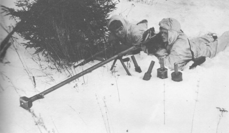 Soviet armor-piercers with an anti-tank rifle of the Degtyarev system ...