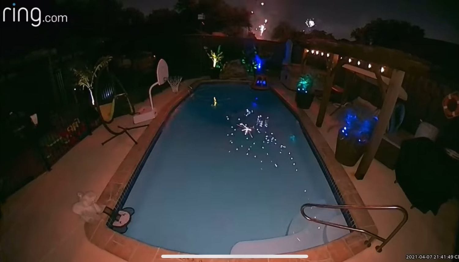 Fireworks reflected in the pool. Dallas, TX