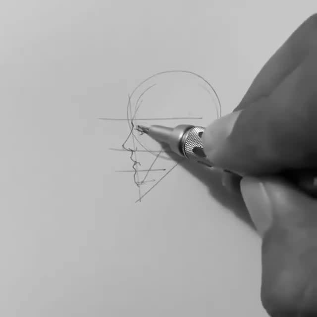 A skilled artist doing a simple, but impressive art exercise