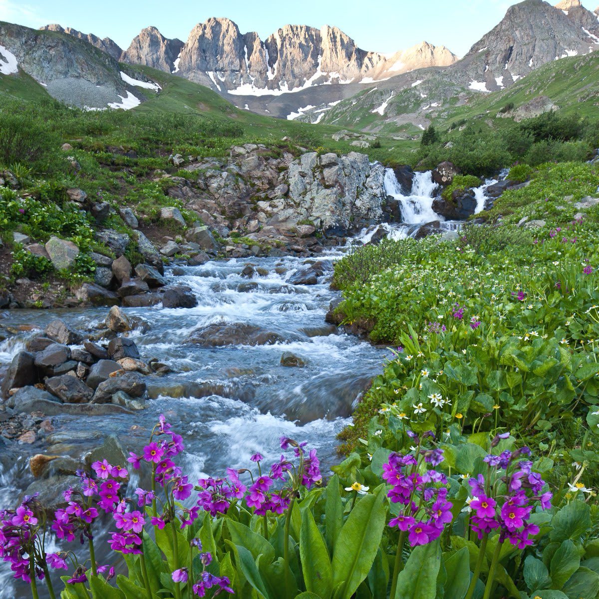 With dramatic rocky peaks, wildflower meadows & picturesque streams ...