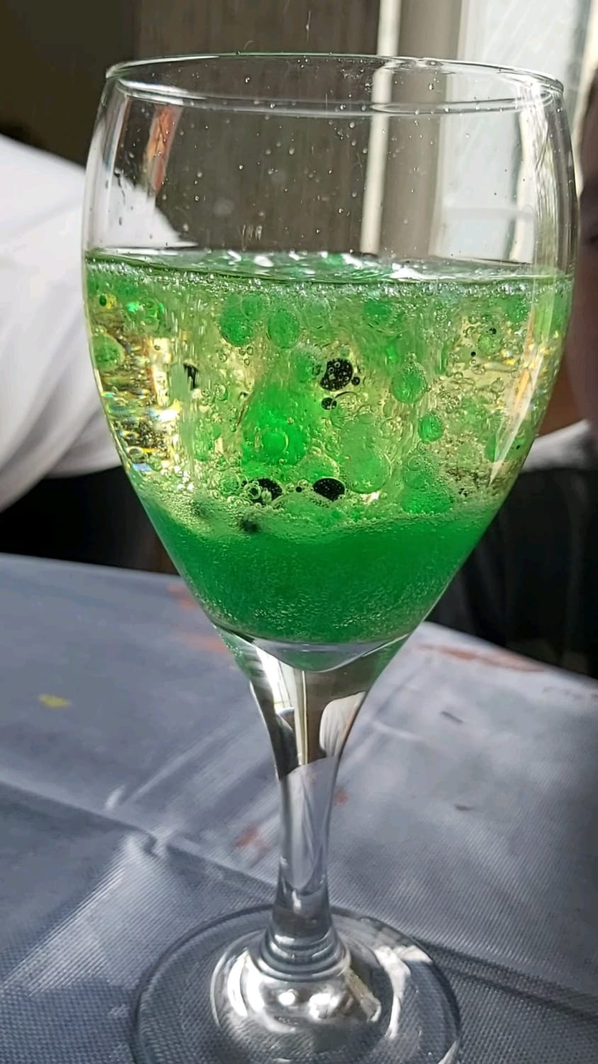 Science experiment with Alka Seltzer, oil, and water