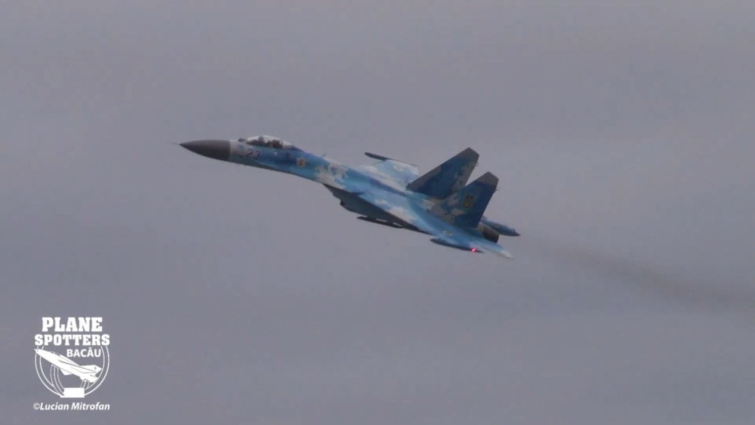 Ukrainian Su-27 does a wing wave as it takes off to return from Romania ...