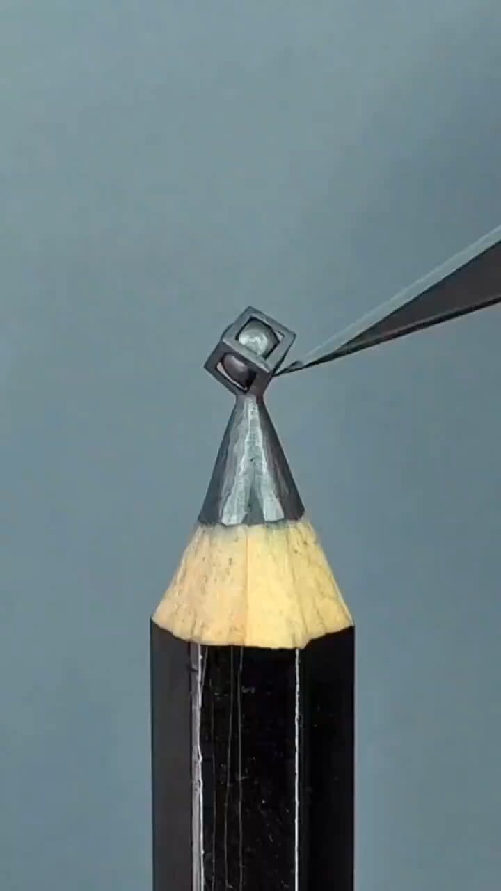 Incredible pencil art, look at the ball in the cube