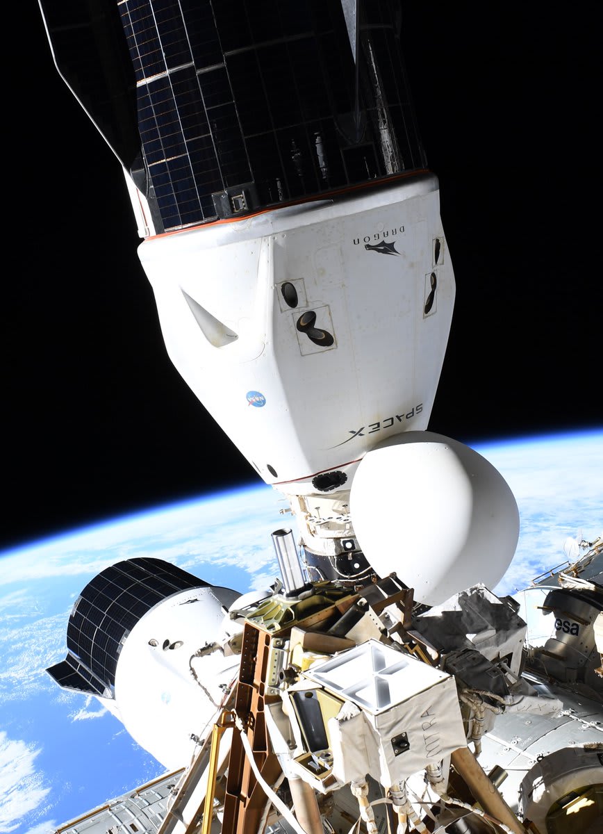 Two @SpaceX Dragons docked at the @Space_Station. @Thom_astro says, "A ...