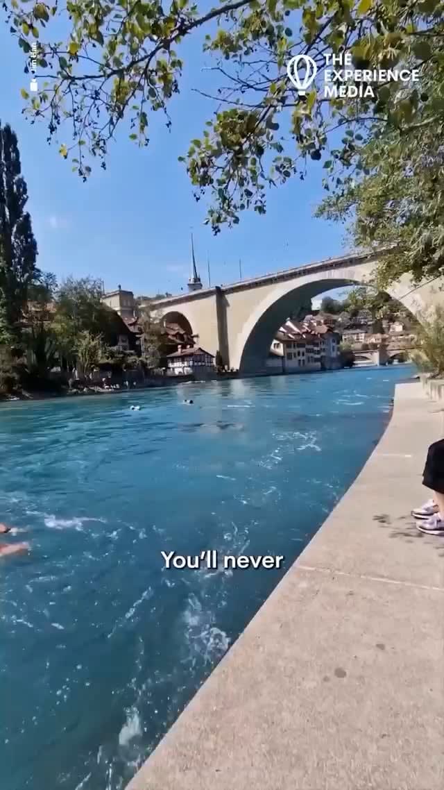 Workers In Bern Switzerland Float Down The River To Commute