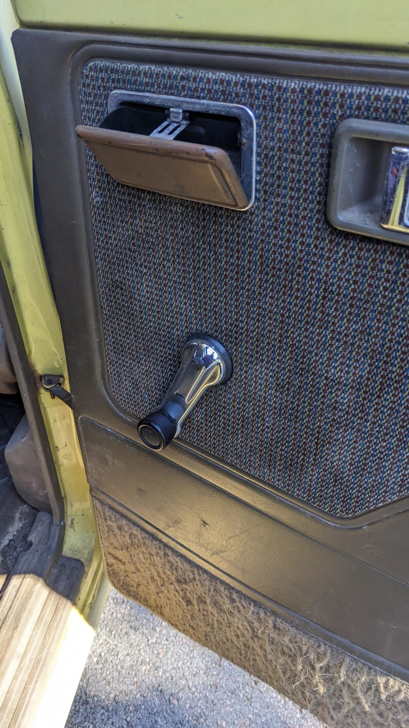 Ashtrays for the rear passengers, hand crank window winders.