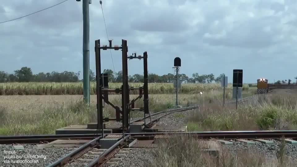 Rail tracks across rail tracks. Drawbridge-style crossing used by a ...