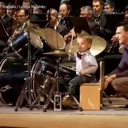Drumming prodigy Lyonya Shilovsky leads an entire orchestra!