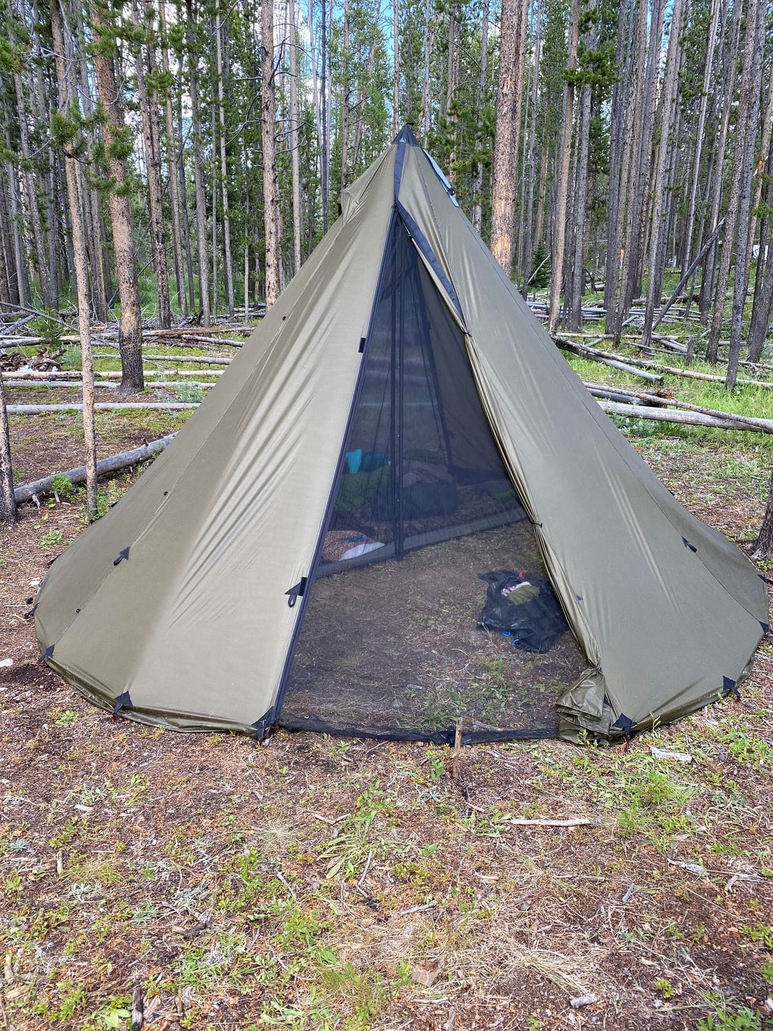 Got to test out the SO tipi and nest last week. Set up in rain and hail ...