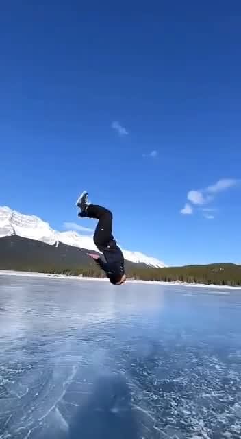 This ice-skating backflip on a frozen lake