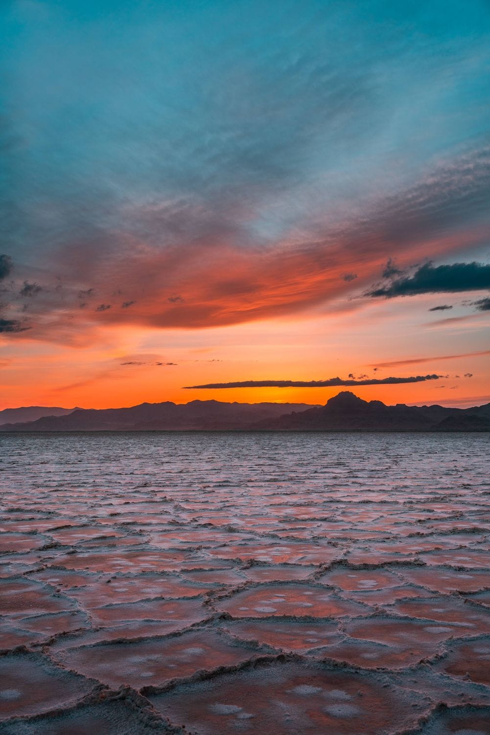 Salty sunset reflections at the Bonneville Salt Flats, Utah, USA by ...