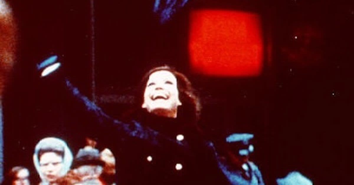 The old lady watching Mary Tyler Moore throw her hat into the air ...