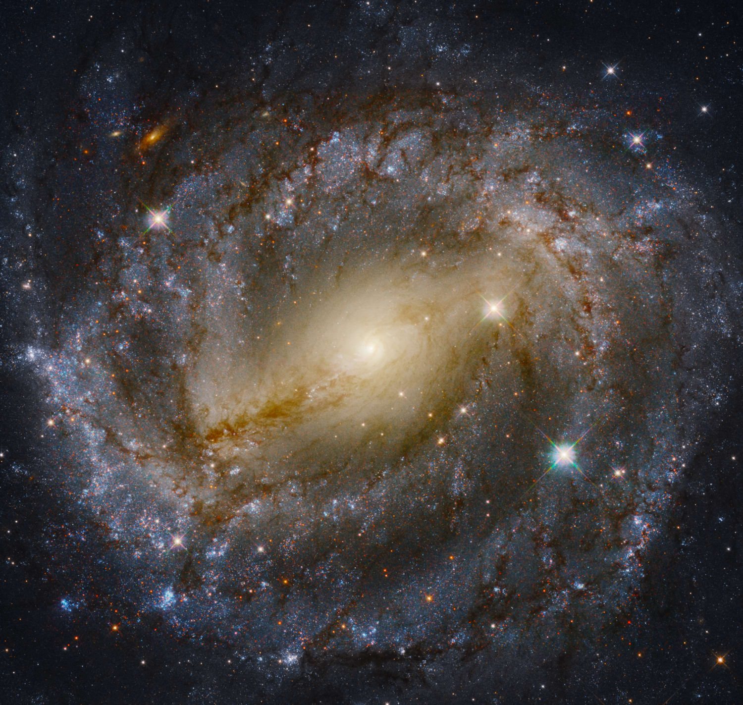Barred spiral galaxy NGC 5643, located around 40 million light-years away from Earth in the ...