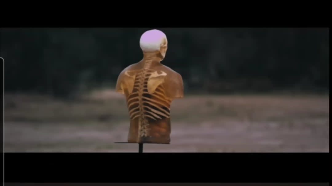 Tank caliber round shooting a ballistics dummy.