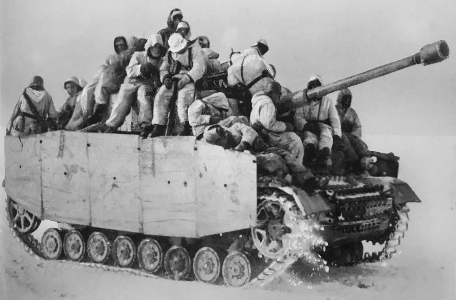 German infantry sit on a Panzer IV shortly before battle on the Eastern ...