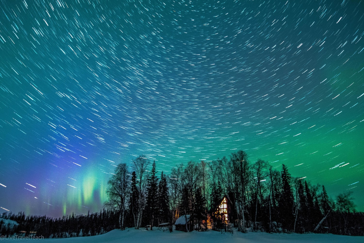 Star trails with aurora borealis above a cabin on Christiansen Lake ...