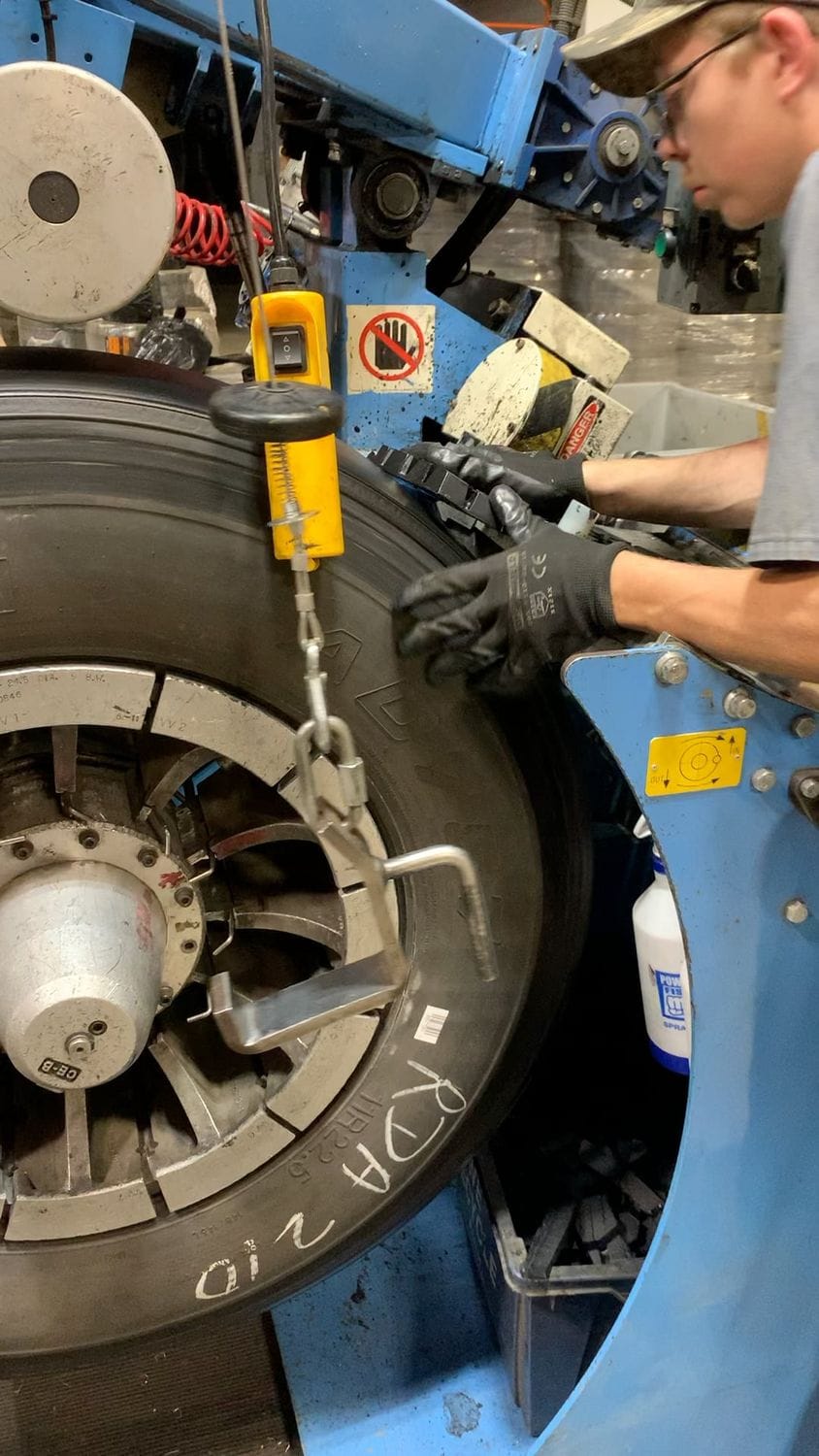 Putting new tread on a tire