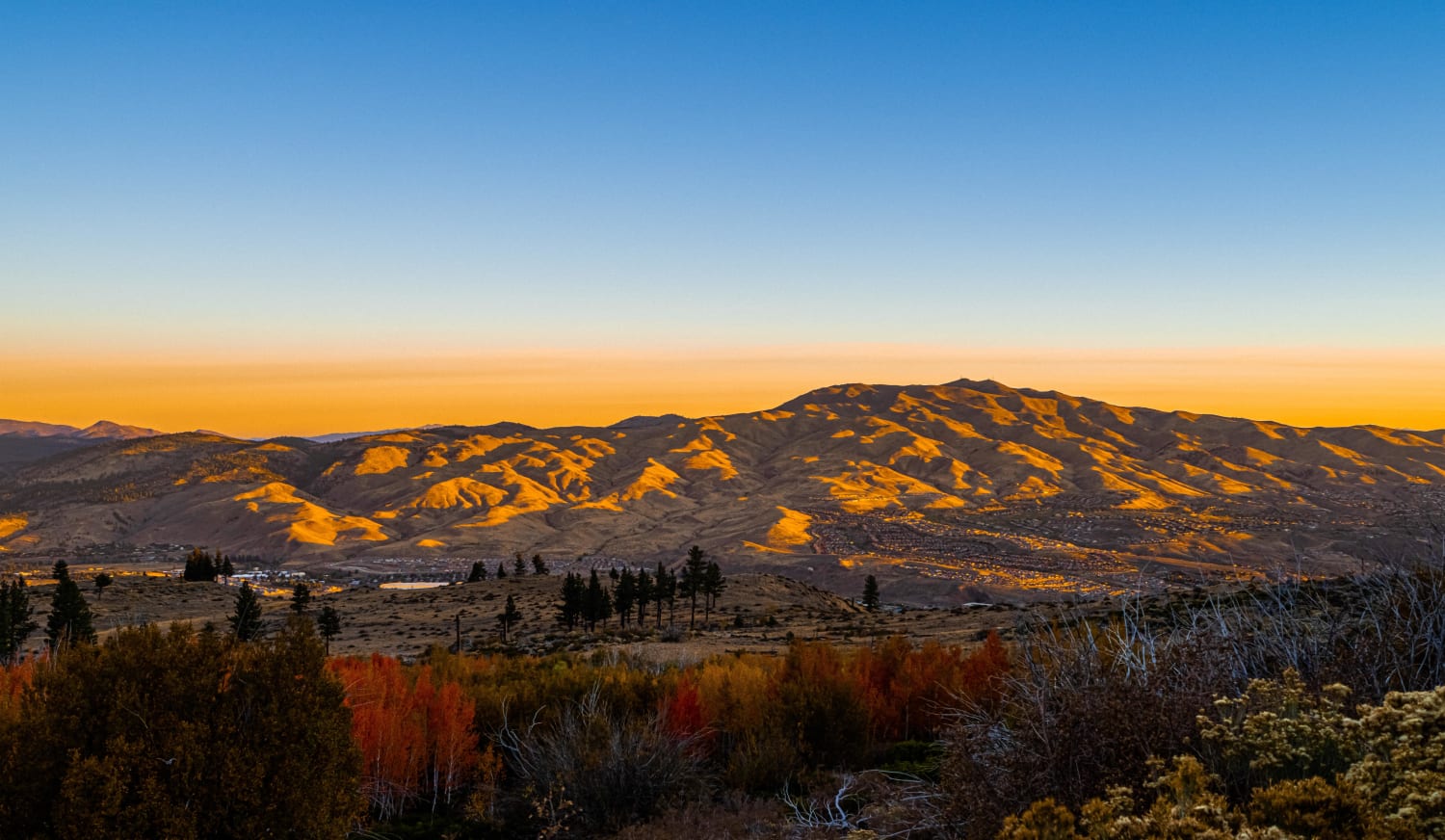 I took this picture of the sunrise over Peavine Mountain in Reno Nv ...