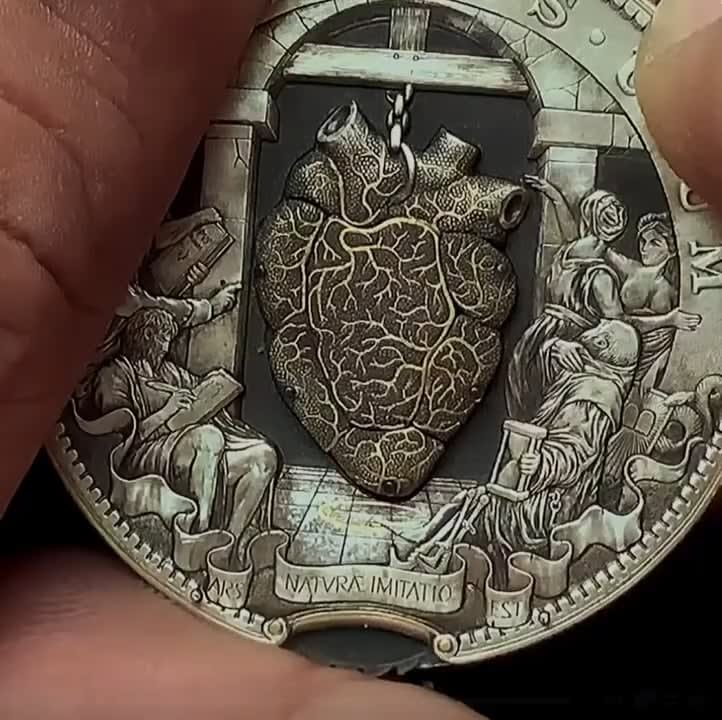 This Beating Heart Coin Carved by Roman Booteen is Absolutely Wild