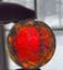 A glass sphere made with dichroic glass and optically clear low iron ...
