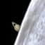 Saturn rising from behind the Moon during a lunar occultation. Captured ...
